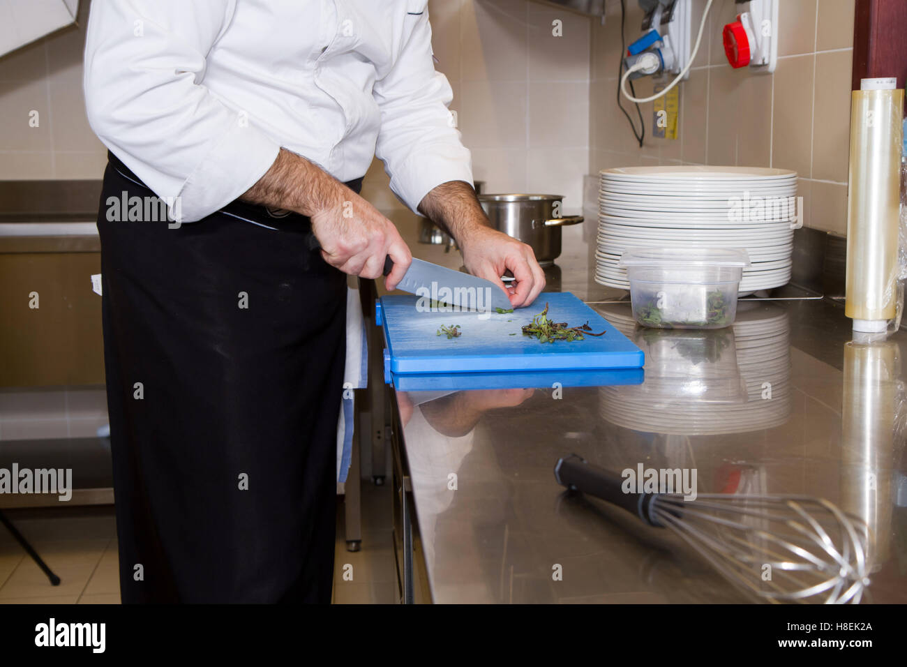 cutting the vegetables in a gourmet kitchen Stock Photo - Alamy