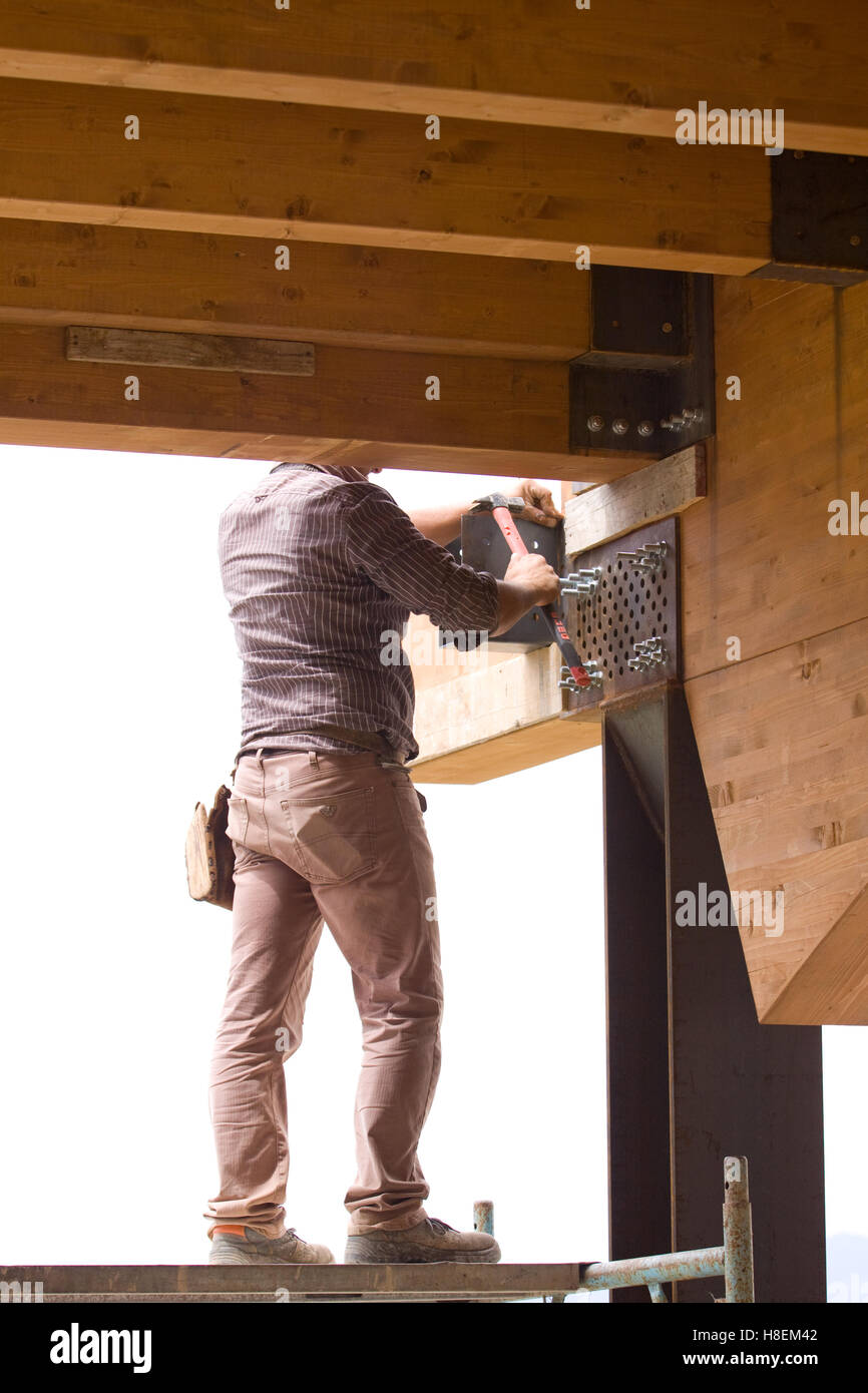 bricklayer working in a building site Stock Photo - Alamy
