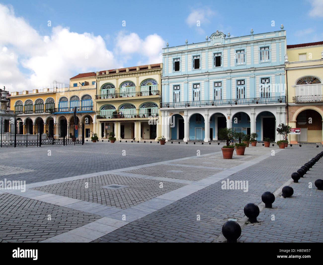 Run DownOrange, blue and Green Building in Havana, Cuba Stock Photo - Alamy