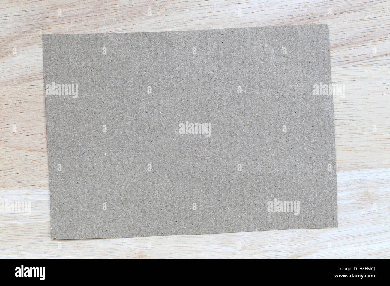 vintage of note paper on wooden background and copy specs you can input ...
