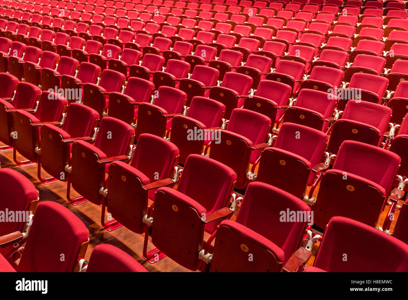 Red color theatre chair in conference room Stock Photo - Alamy