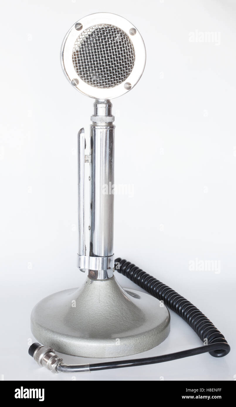 Metal microphone and its cable on a white background Stock Photo - Alamy