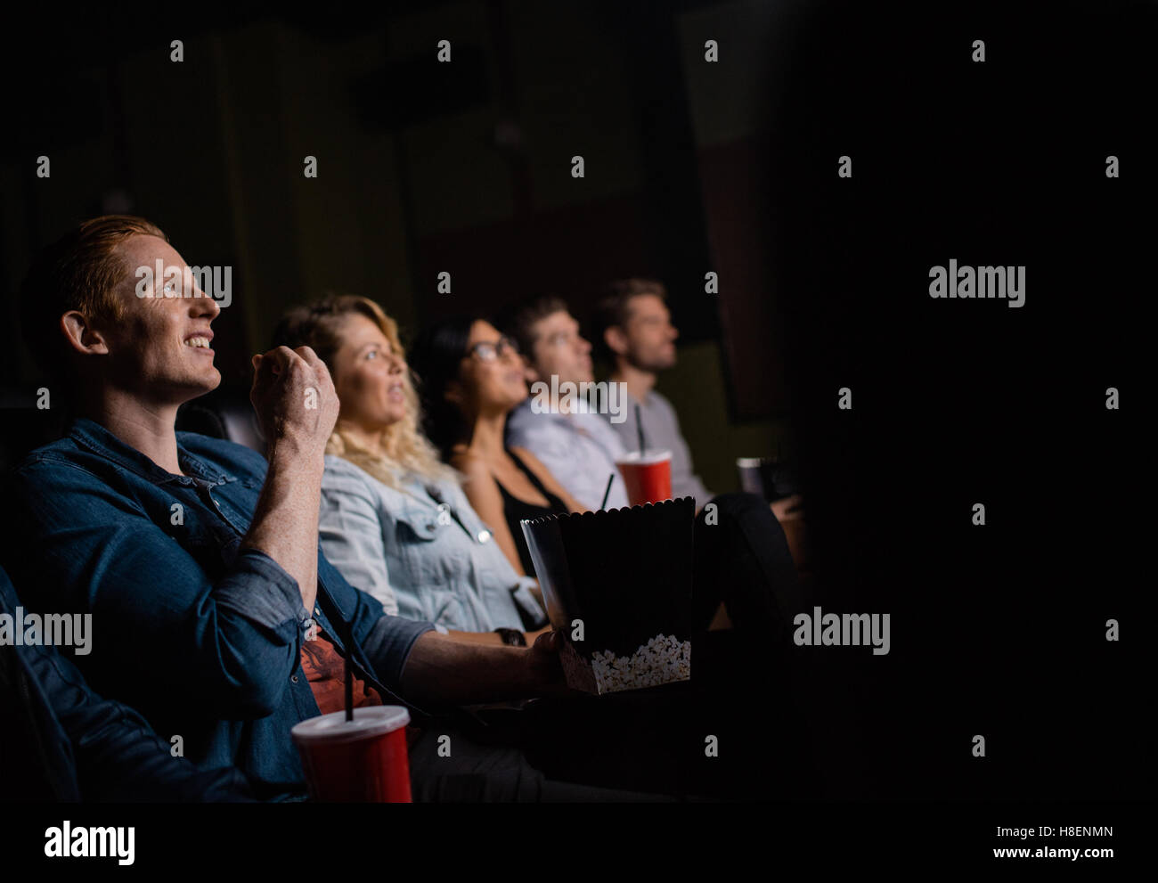 Man eating popcorn hi-res stock photography and images - Alamy