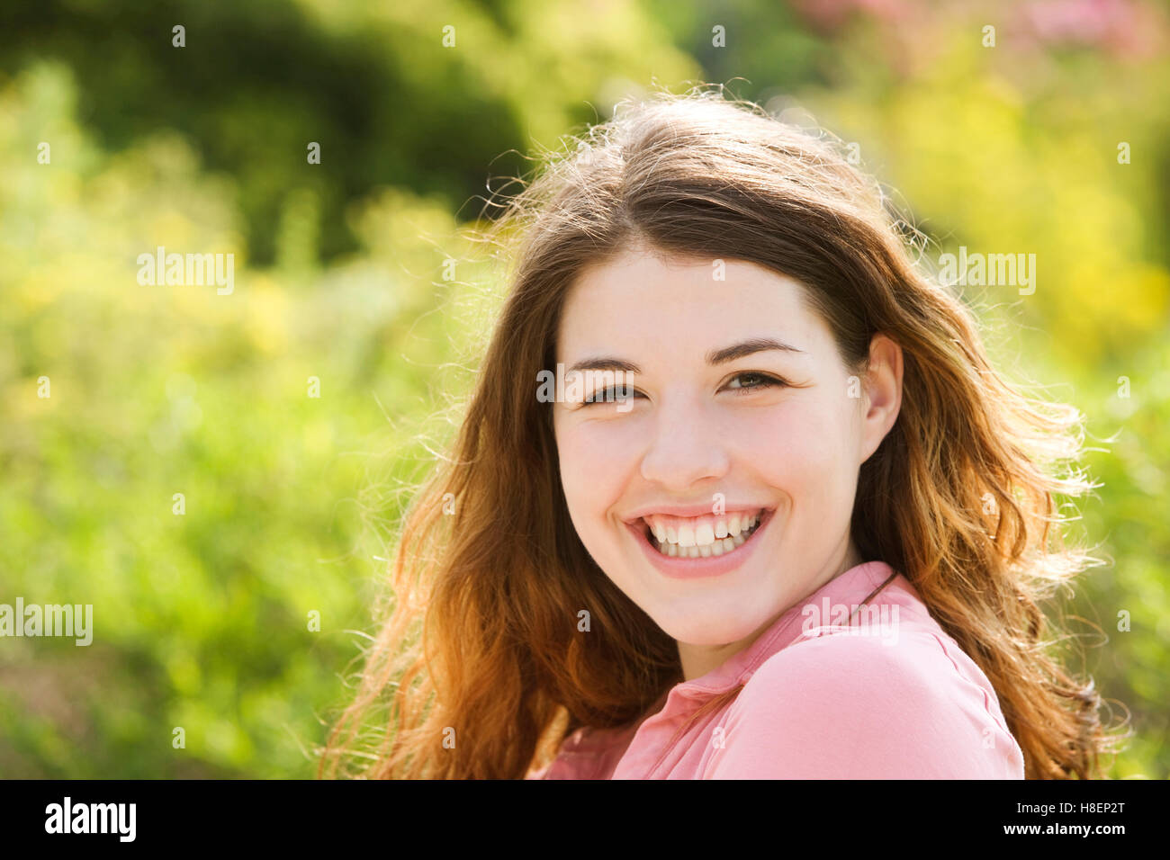 Portrait of young woman outside Stock Photo - Alamy