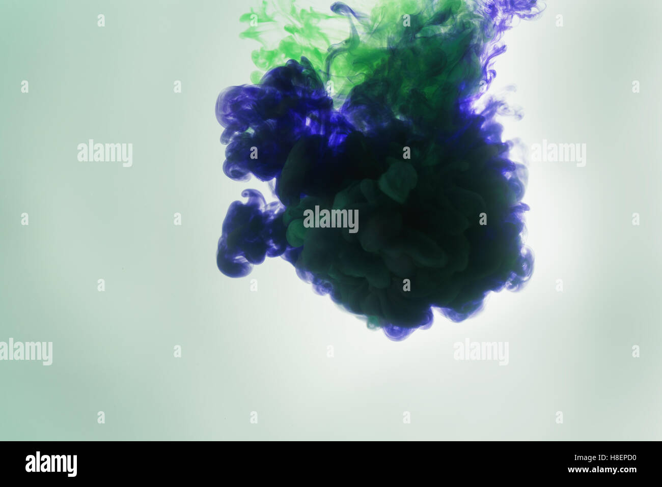 blue watercolor paint in water Stock Photo - Alamy