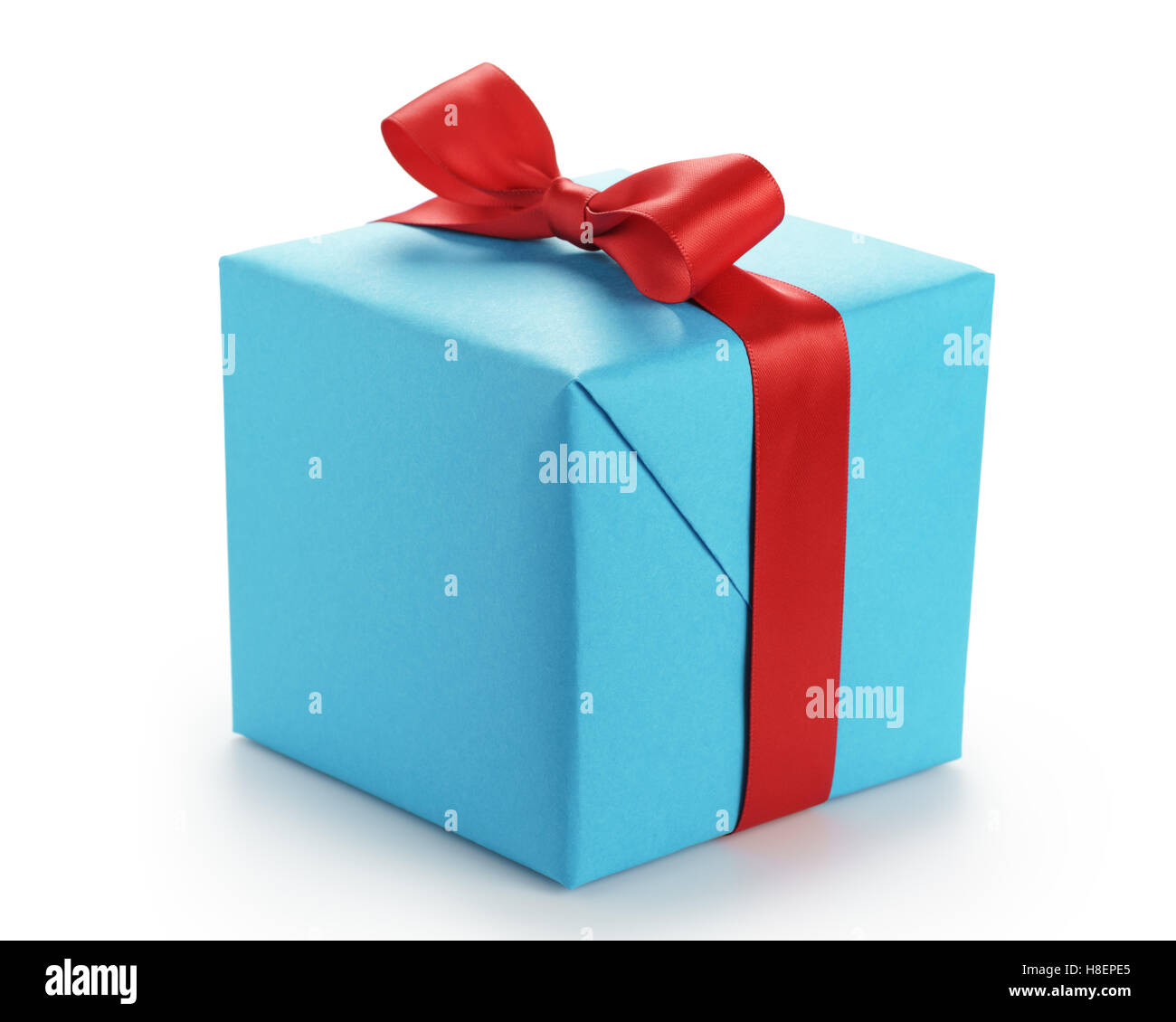 blue gift box with red ribbon bow isolated on white Stock Photo - Alamy