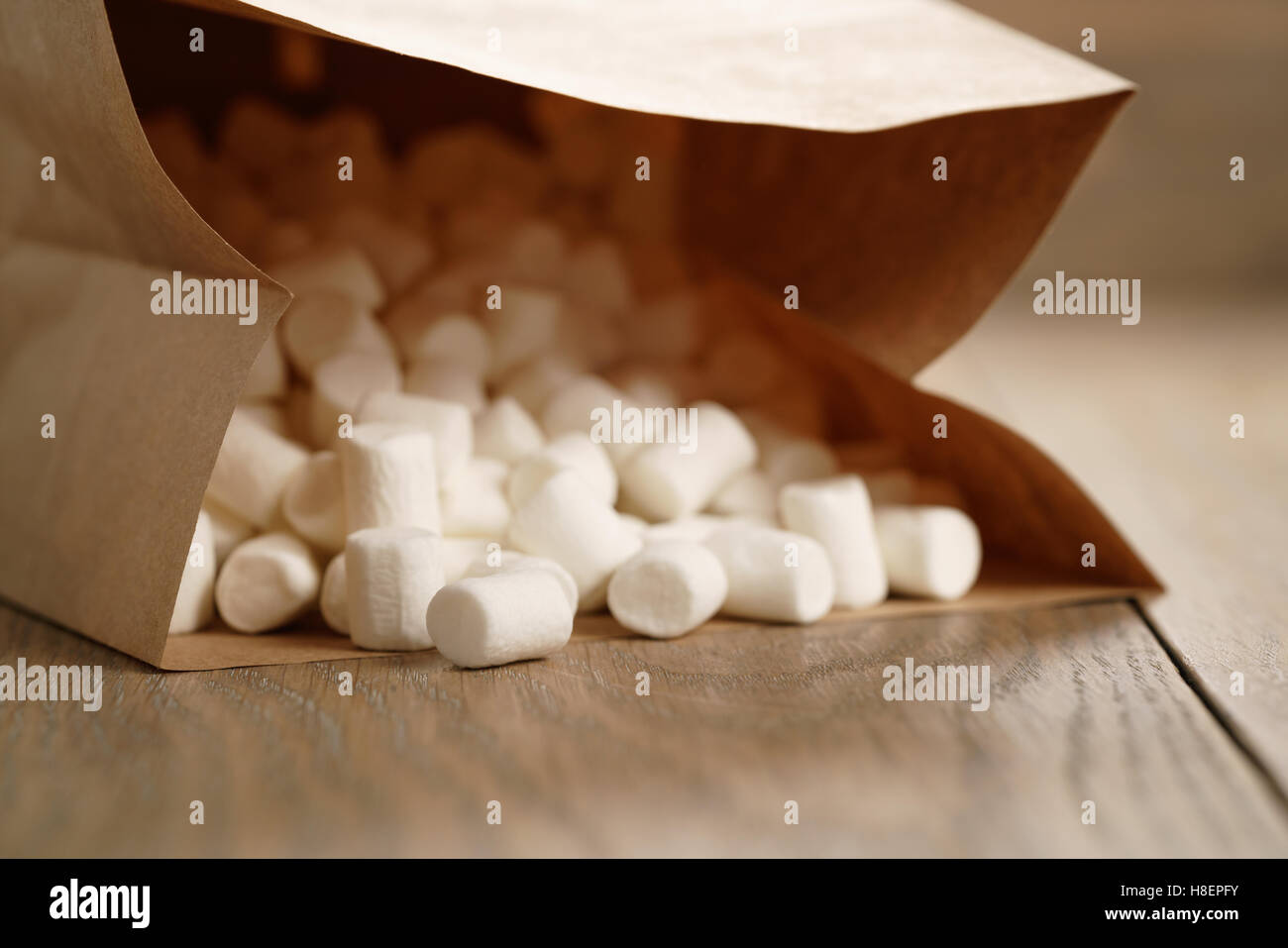 marshmallow in brown craft paper bag on wooden table Stock Photo - Alamy