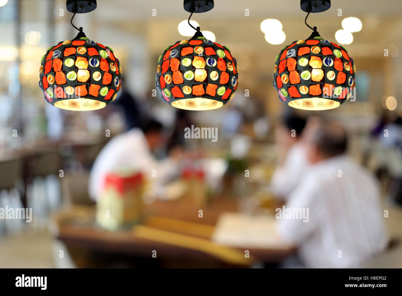 Warm lighting modern ceiling lamps in the cafe and interior decoration ...