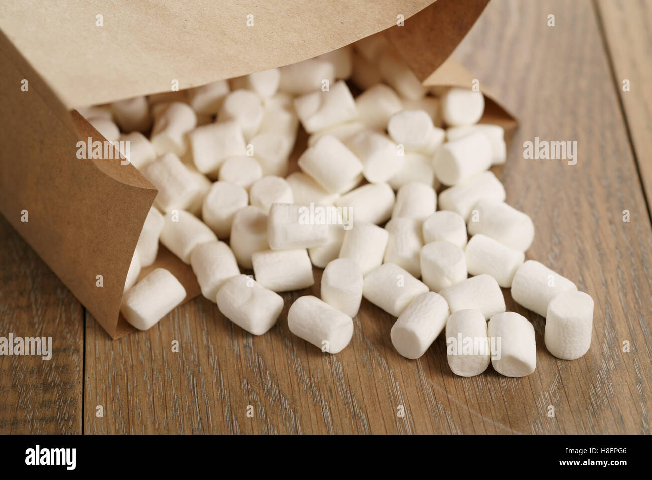 marshmallow in brown craft paper bag on wooden table Stock Photo - Alamy