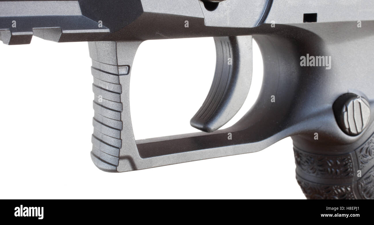 Squared triggerguard and trigger on a polymer handgun Stock Photo - Alamy