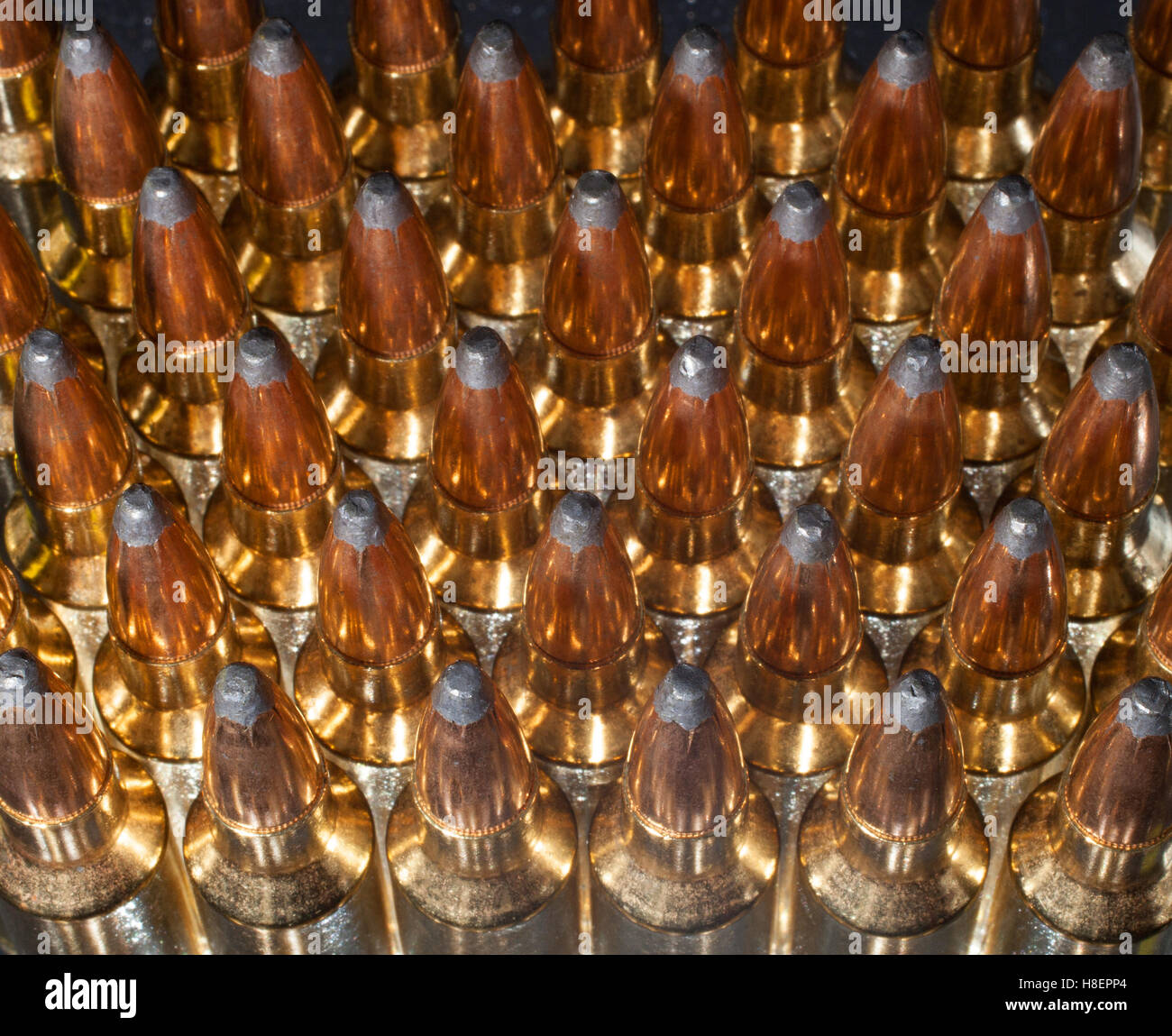 Shiny and reflective ammunition for a high powered rifle Stock Photo ...