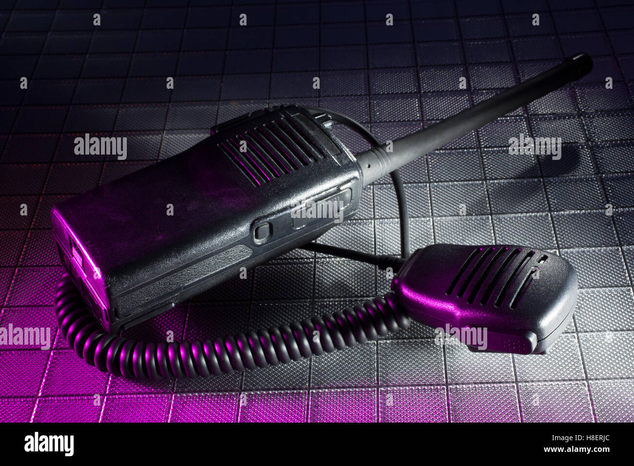 Handheld two way radio with a microphone and purple coloration Stock ...