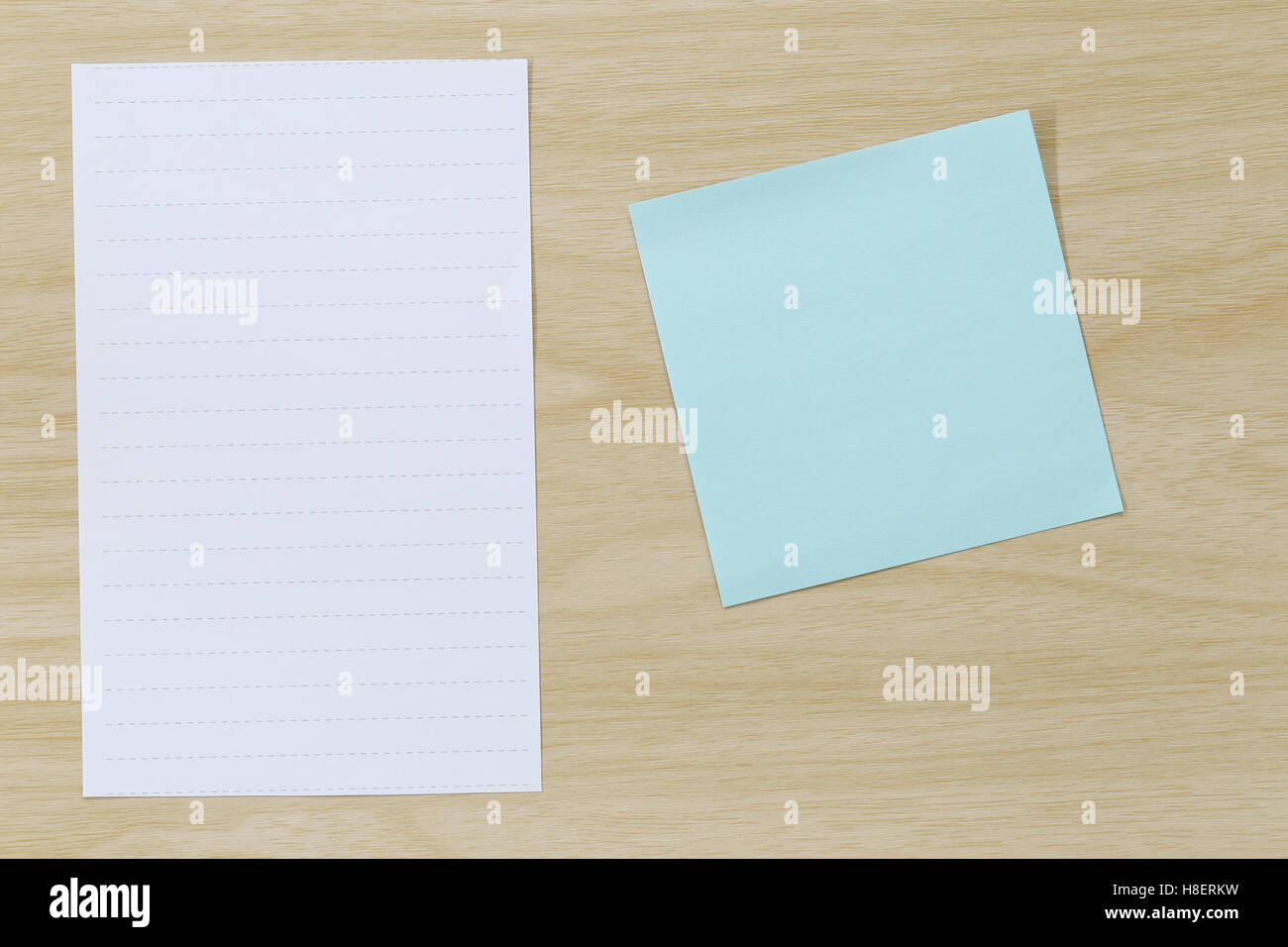 Note paper placed on wooden floor,Design ideas can be Entered your ...