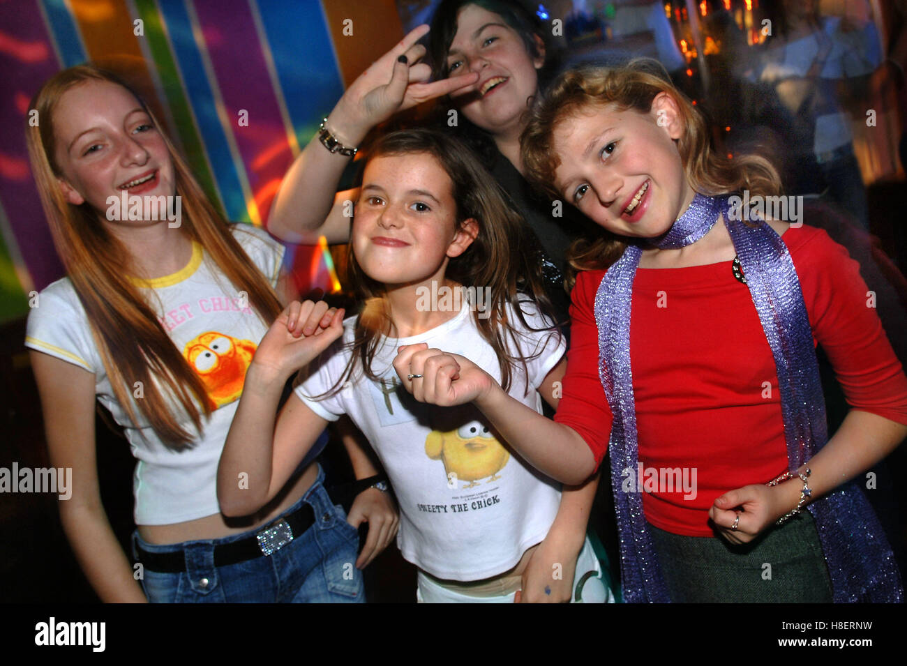Adolescent girls dancing at a discotheque for young people.a UK Stock ...