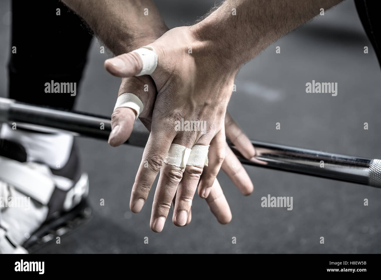 Hands above barbell bar Stock Photo - Alamy
