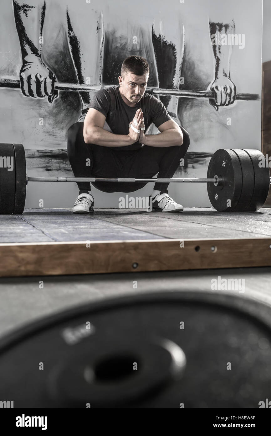 Relaxation before training in gym Stock Photo - Alamy