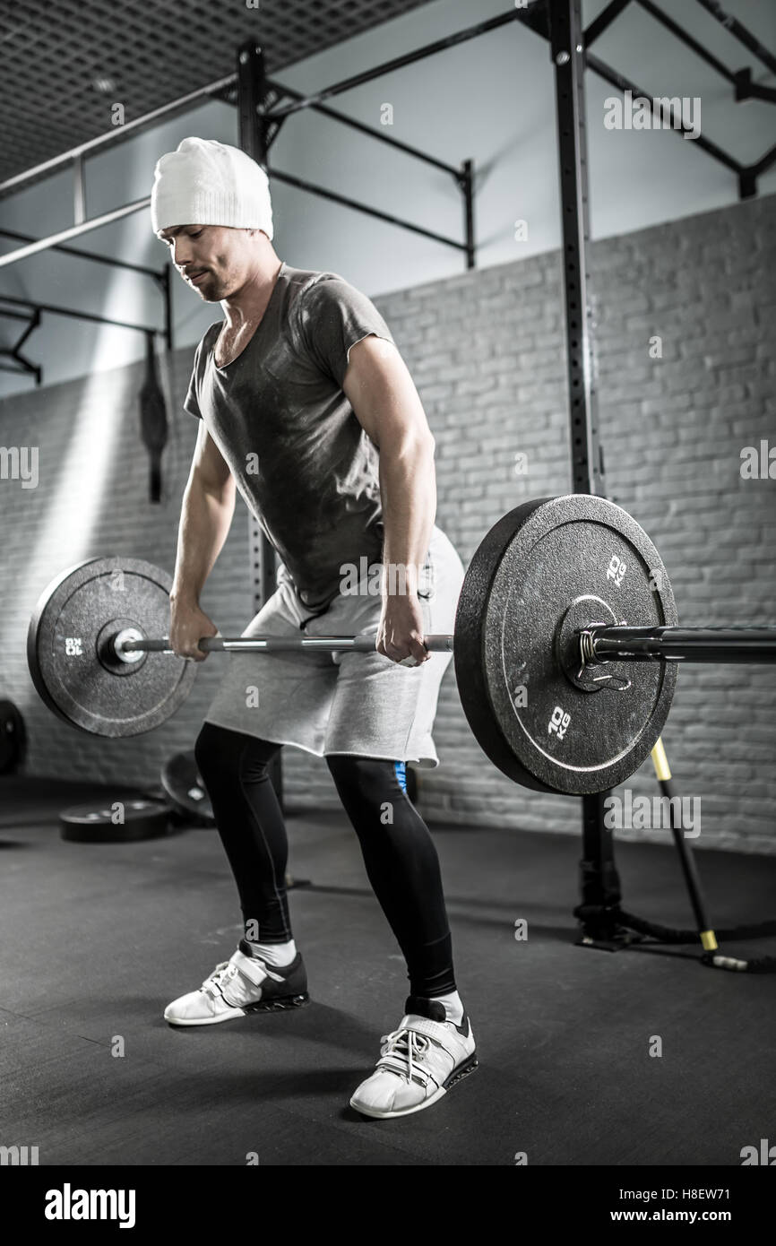 Man's crossfit workout with barbell Stock Photo - Alamy