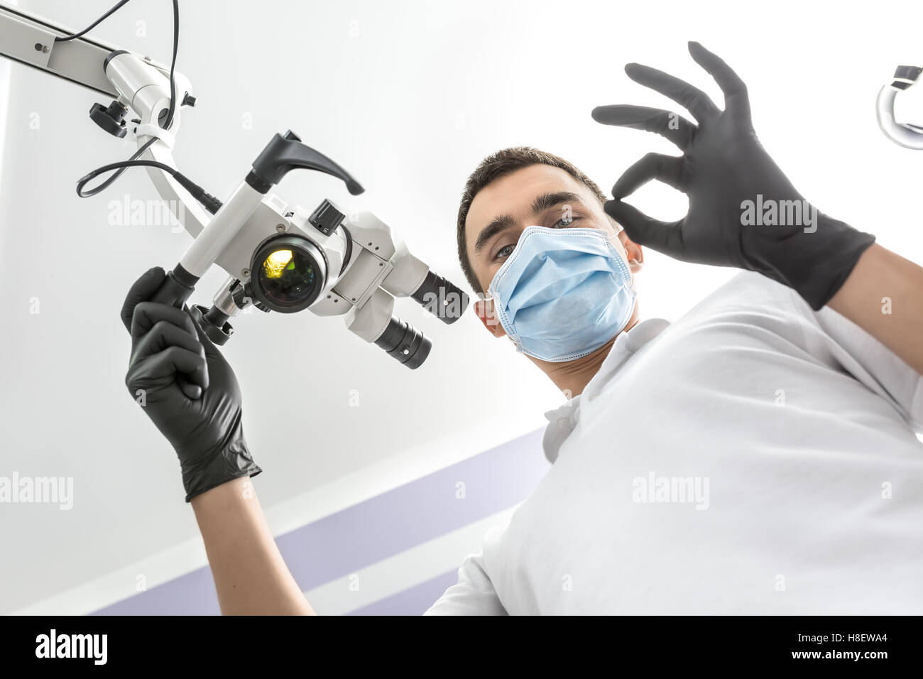 Doctor shows OK symbol Stock Photo - Alamy