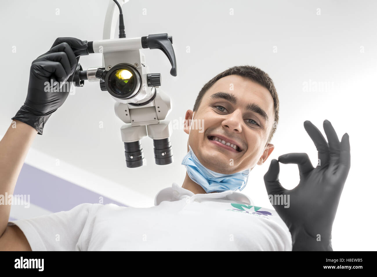 Doctor shows OK symbol Stock Photo - Alamy