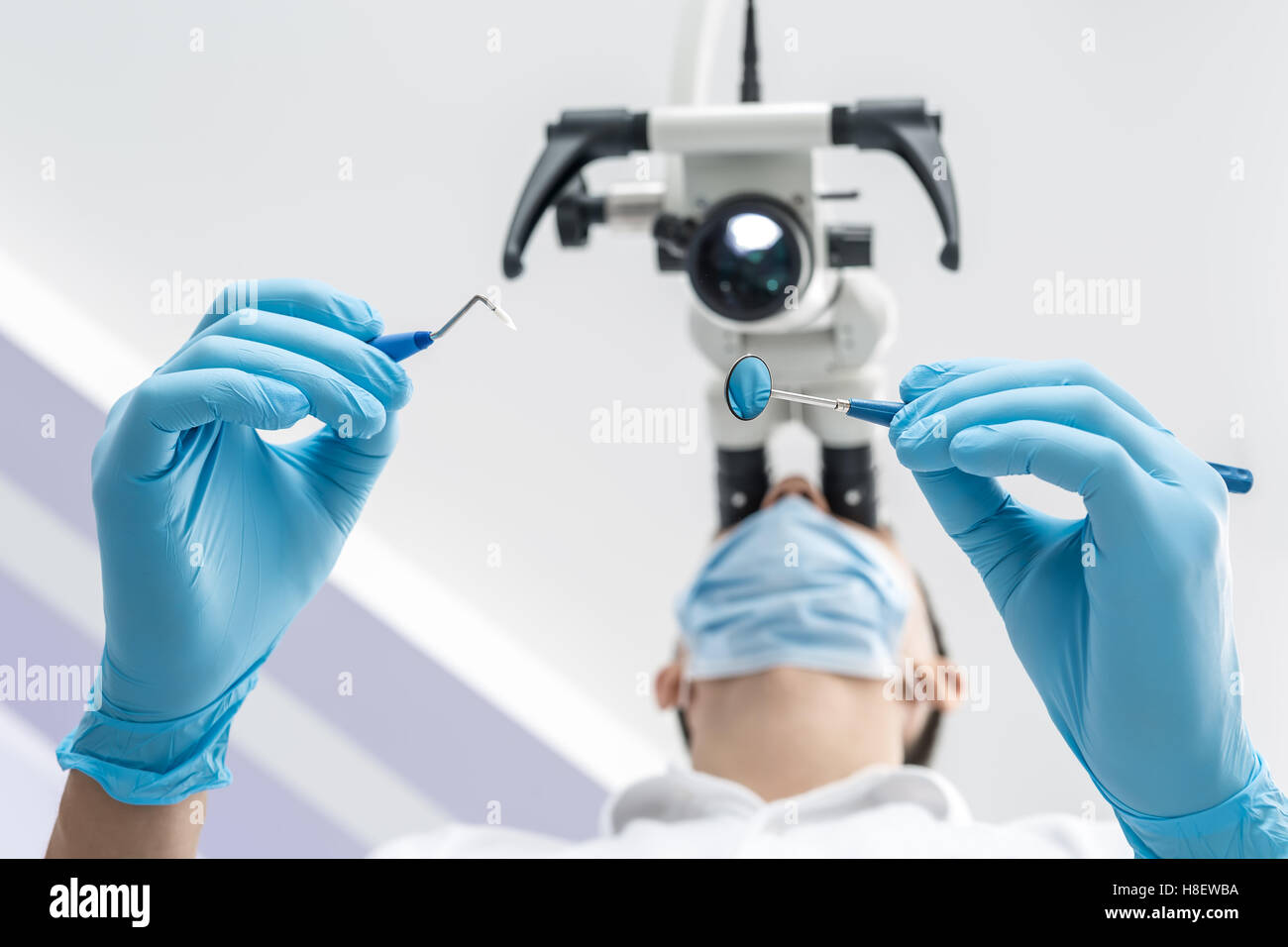 Using a dental microscope Stock Photo - Alamy