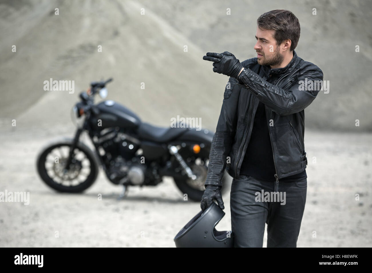 Bearded motorcyclist outdoors Stock Photo - Alamy