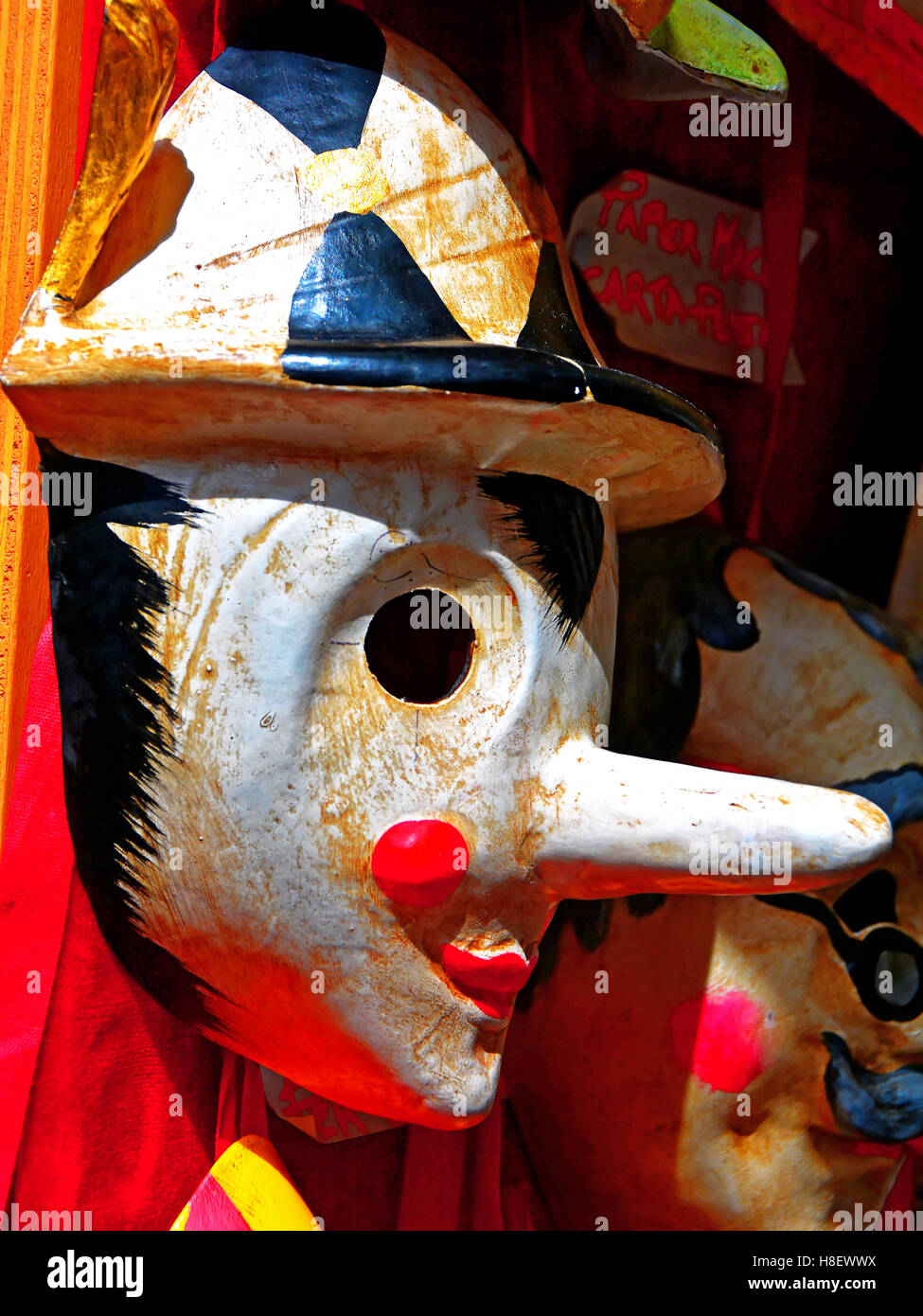 Pinocchio style venetian carnival face mask smiling Stock Photo - Alamy