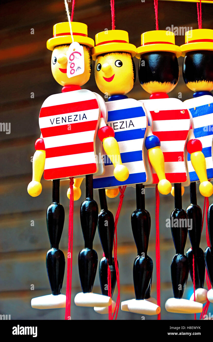 Venice venetian wooden gondolier puppets Stock Photo - Alamy