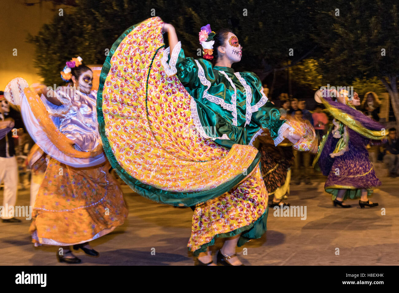 Young women dressed as skeletons perform traditional dances during the ...