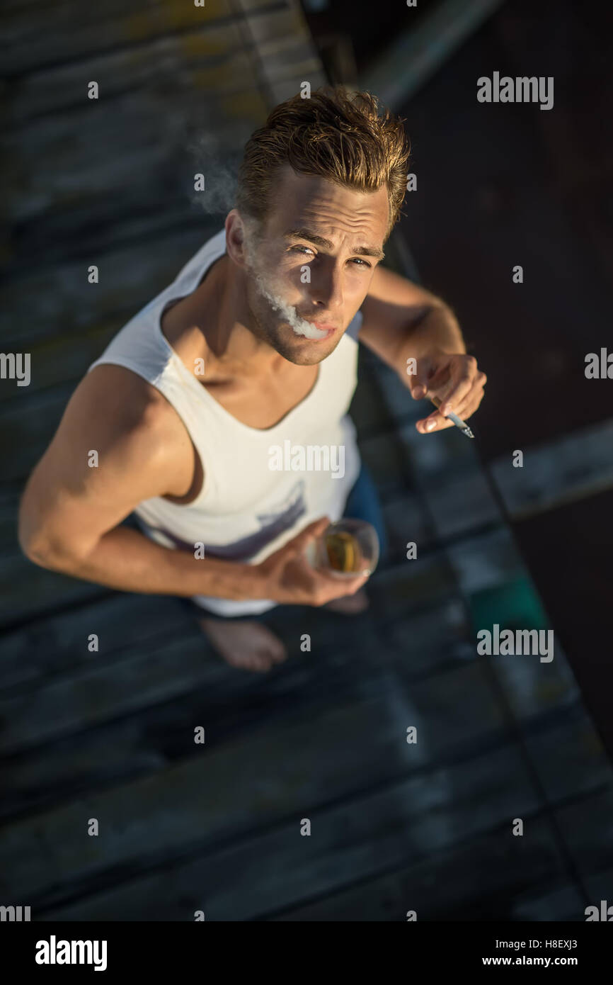 Stylish smoker outdoors Stock Photo - Alamy