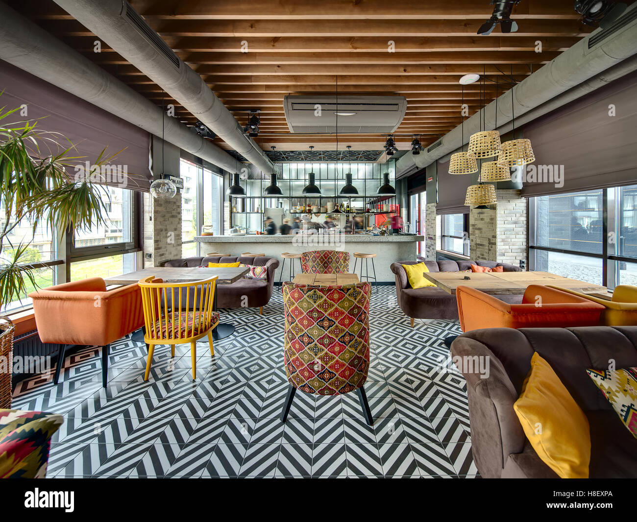 Restaurant with open kitchen Stock Photo - Alamy