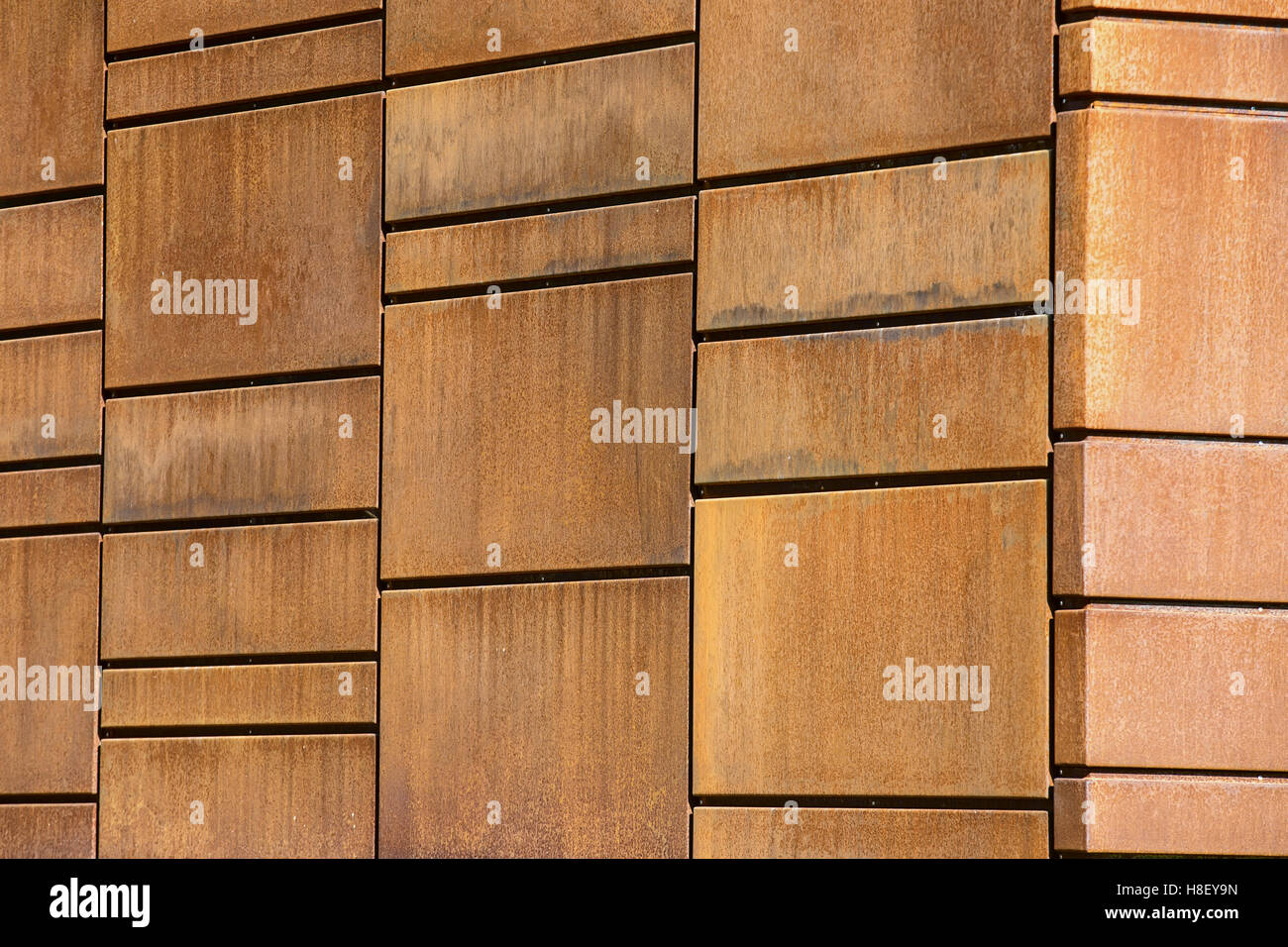 Orange rusty metal tiles Stock Photo - Alamy