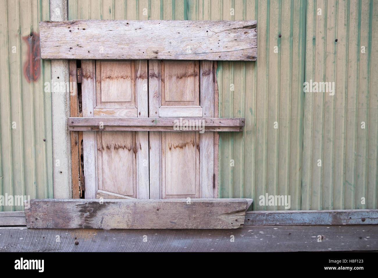 old window, sealed with wooden planks, background Stock Photo - Alamy
