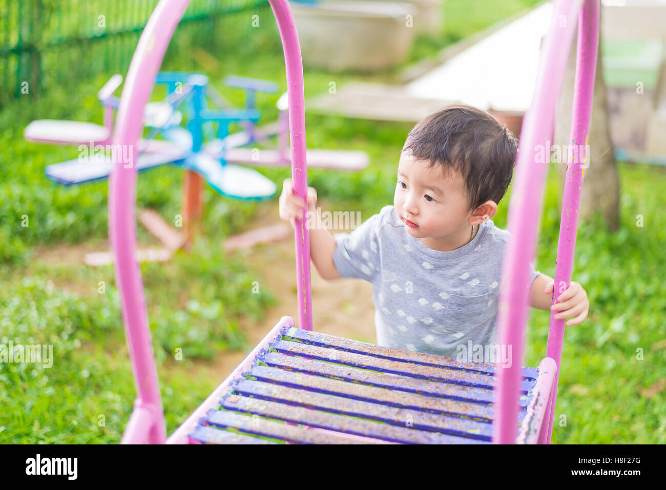 Asian toddler climbing hi-res stock photography and images - Alamy