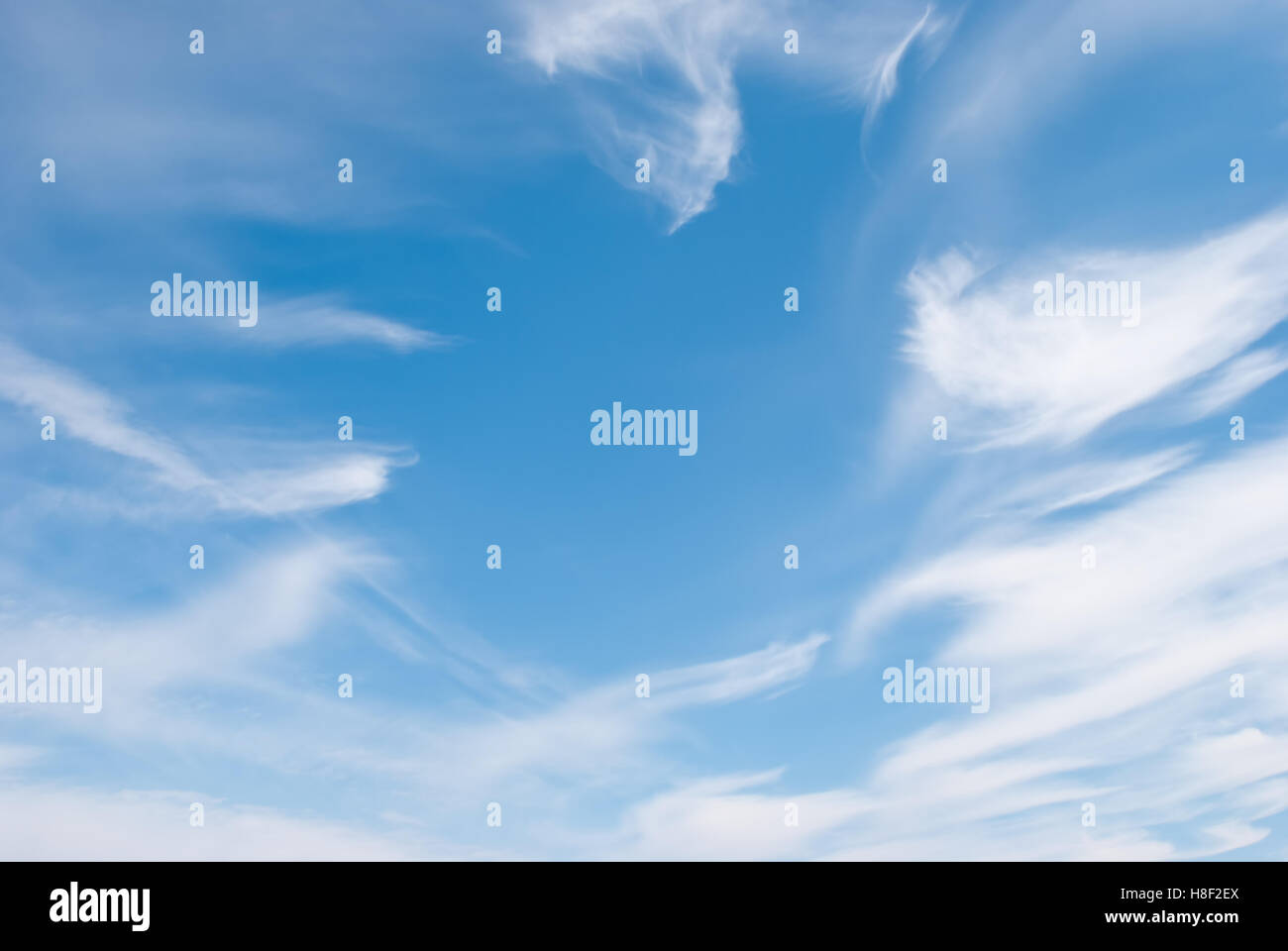 Natural round window in cirrus clouds Stock Photo - Alamy