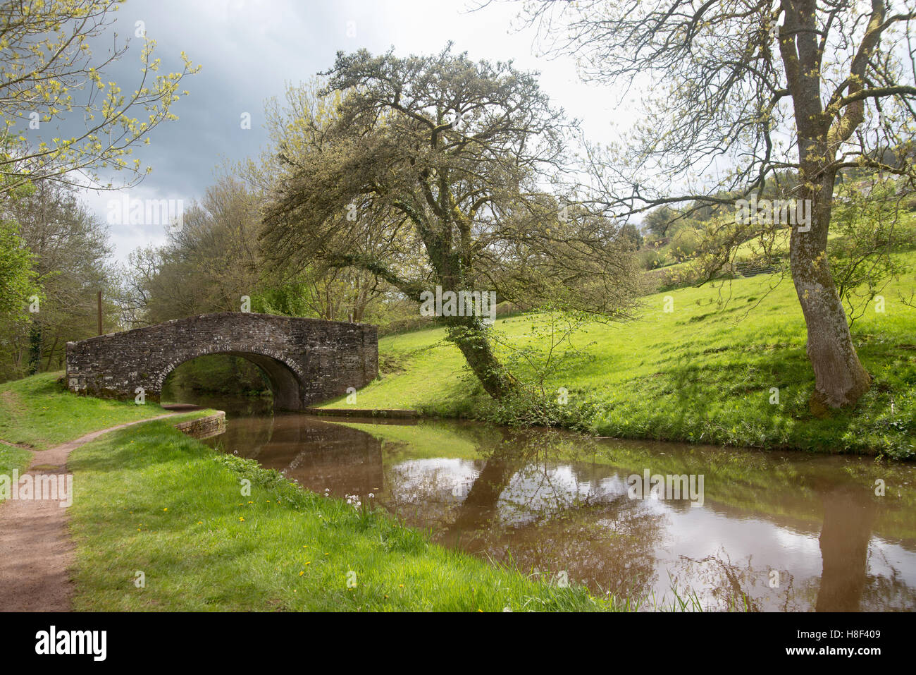pleasant walking path alongside canal Stock Photo - Alamy