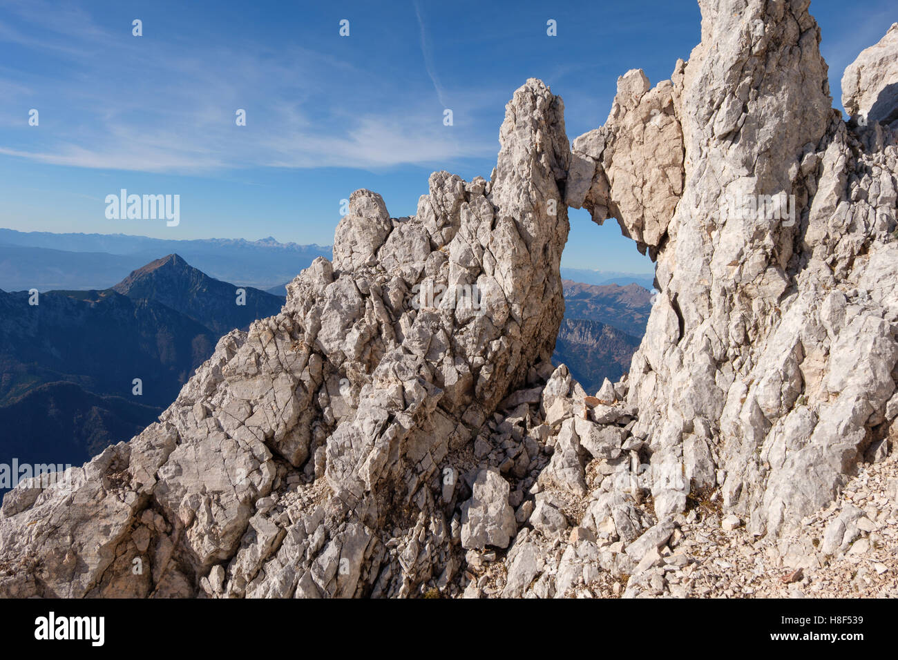 Hole in a rock ridge Stock Photo - Alamy