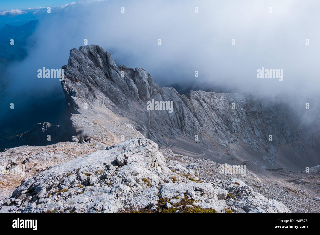 Narrow limestone ridge in clouds Stock Photo - Alamy