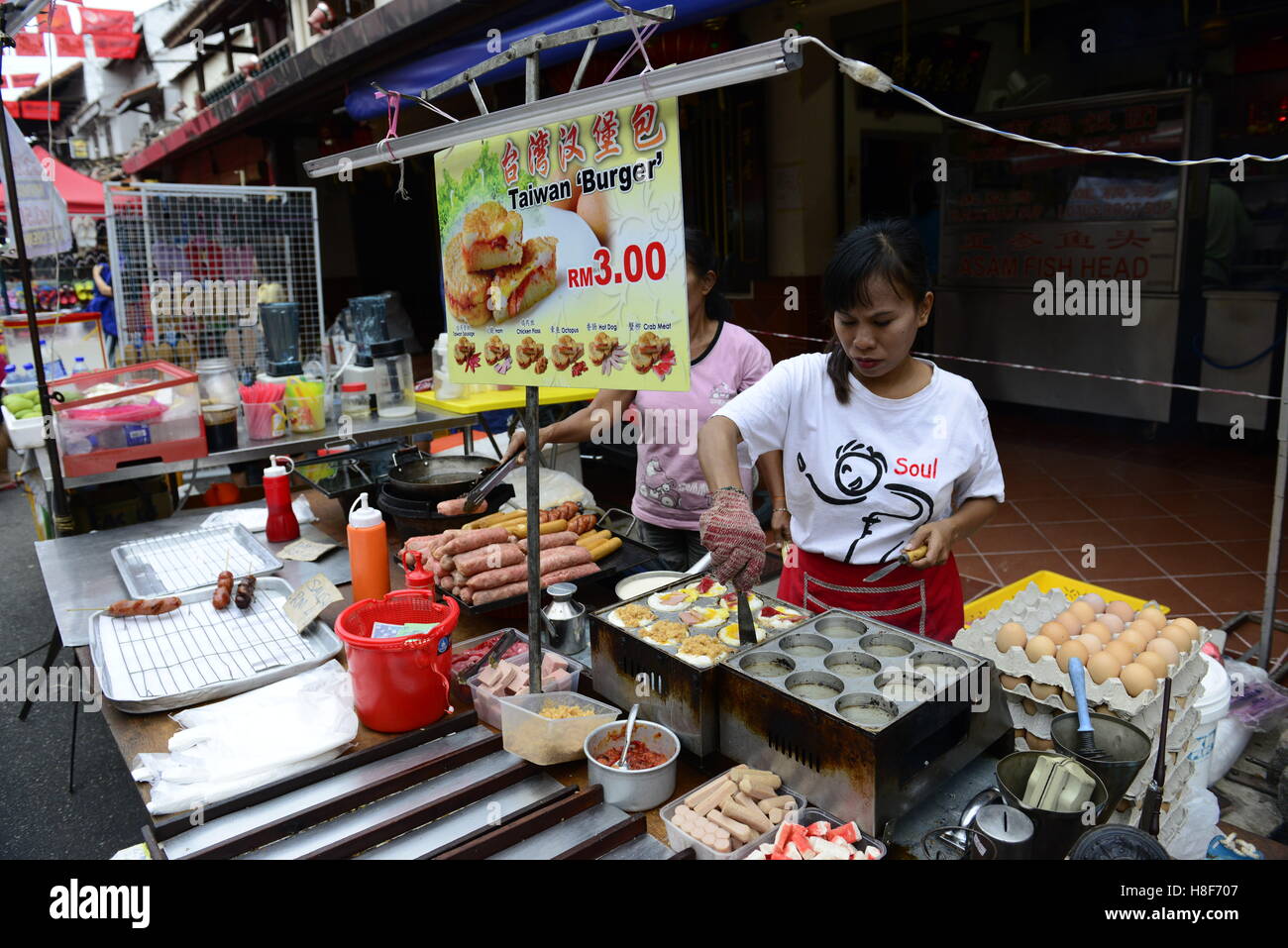 The vibrant street food market in the old town of Malacca in Malaysia ...