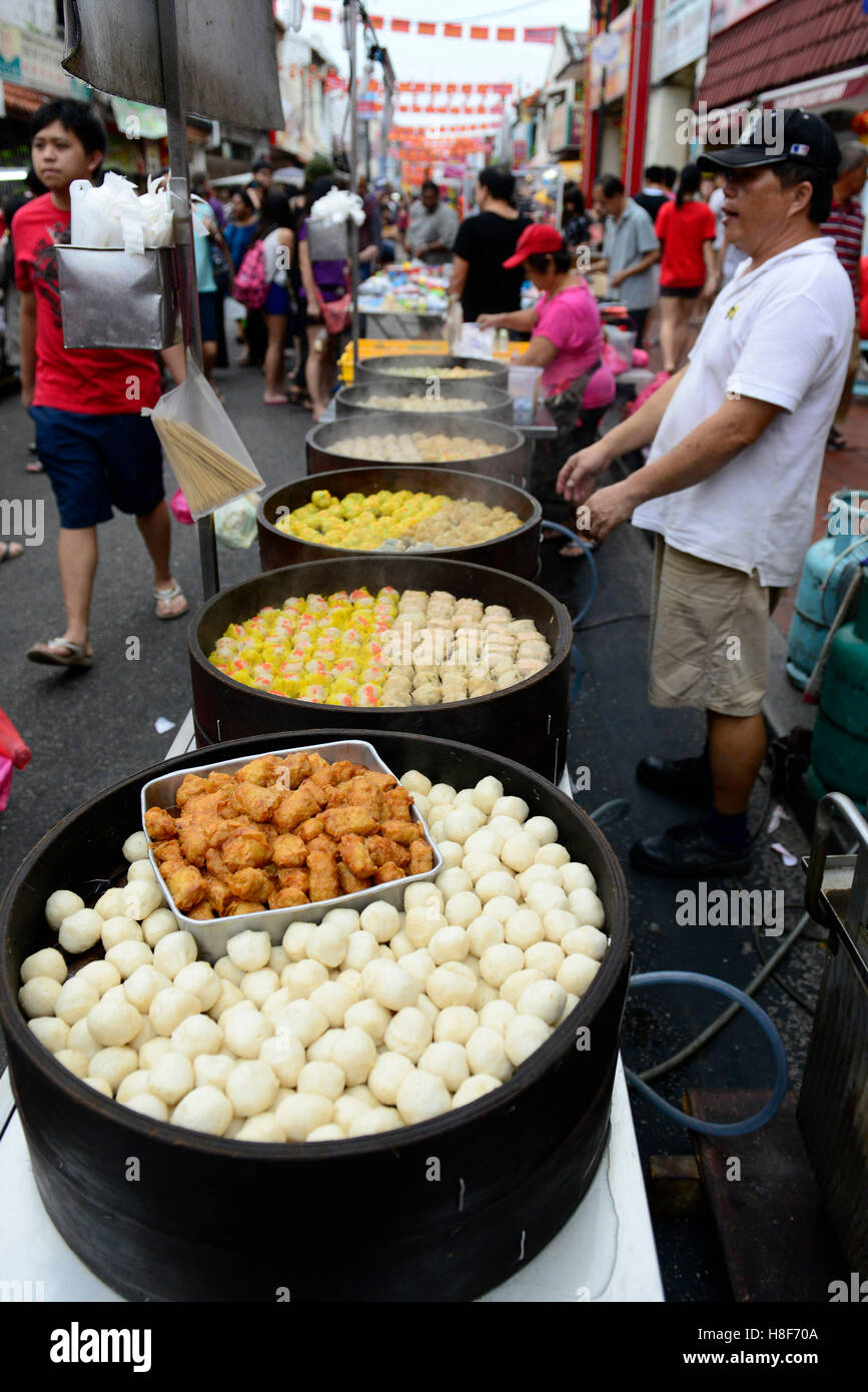 The vibrant street food market in the old town of Malacca in Malaysia ...