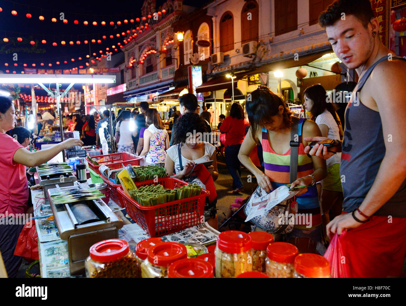 The vibrant street food market in the old town of Malacca in Malaysia ...