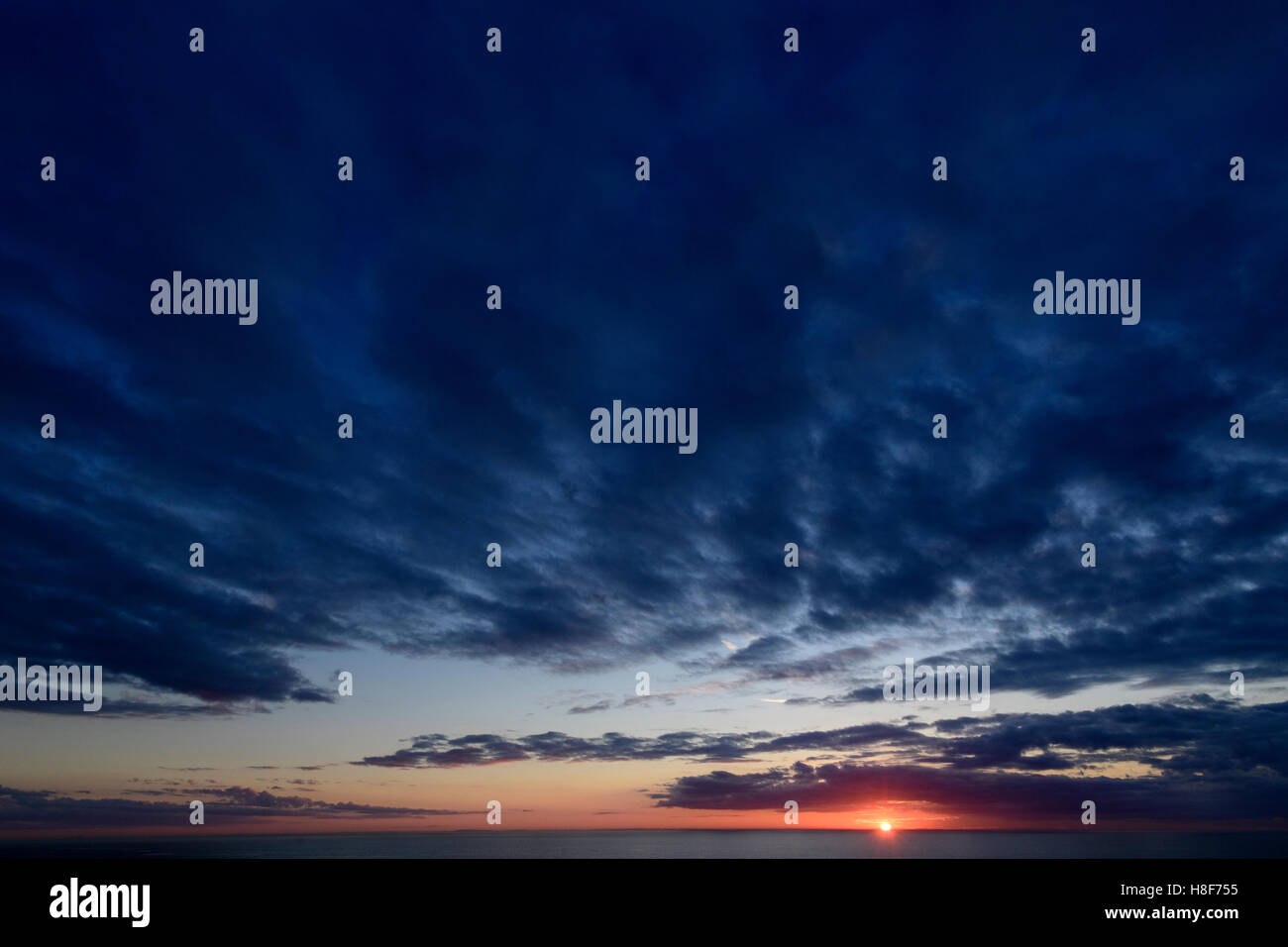 Sunset and dark clouds, North Sea, Norway Stock Photo - Alamy