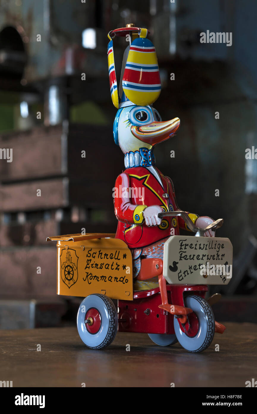 Tin Toys from the 1950s, finished duck as a firefighter in front of an ...