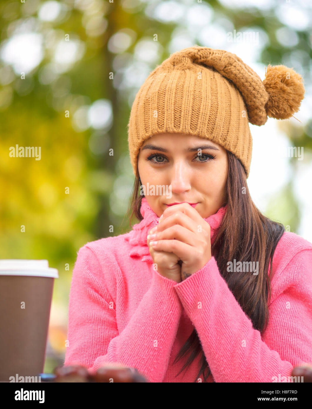 beautiful woman freezing in autumn park, cold autumn Stock Photo - Alamy