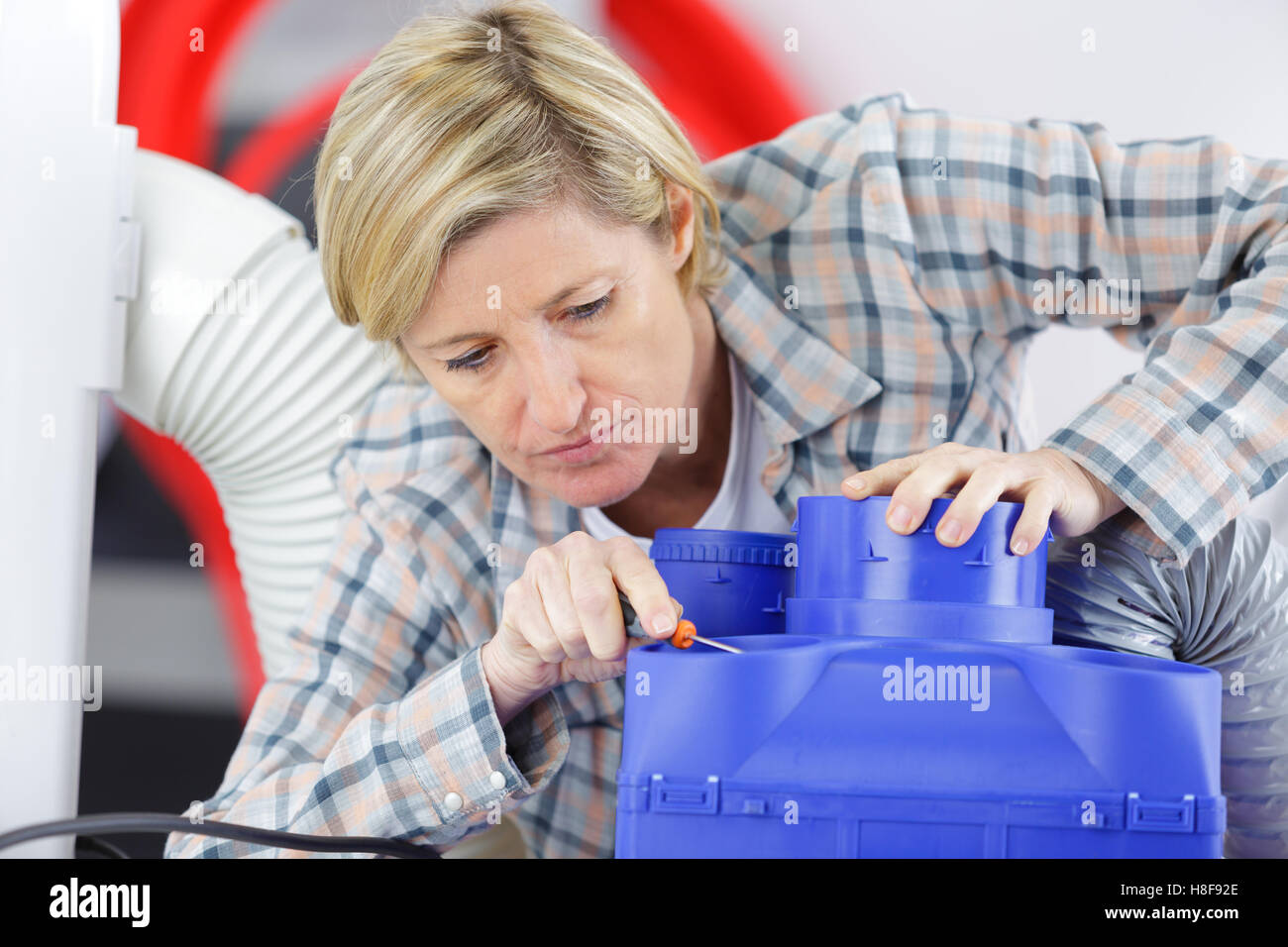 woman working on technical site Stock Photo - Alamy