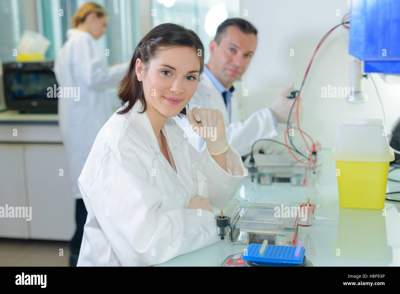 Young beautiful lab technician hi-res stock photography and images - Alamy