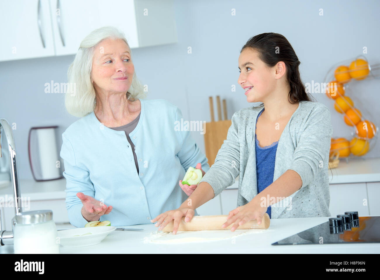 Baking with grandma Stock Photo - Alamy