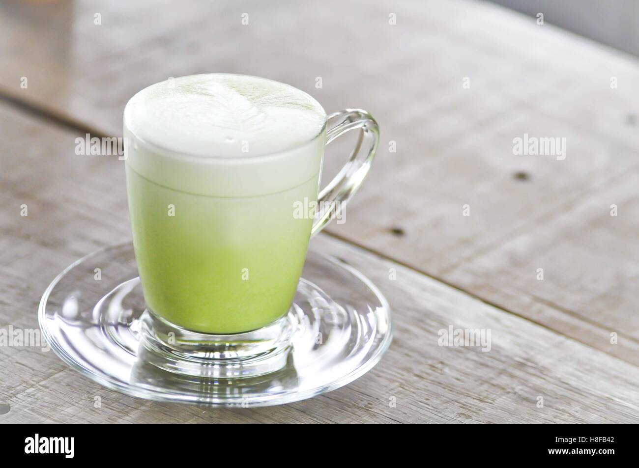a cup of hot milk green tea Stock Photo - Alamy