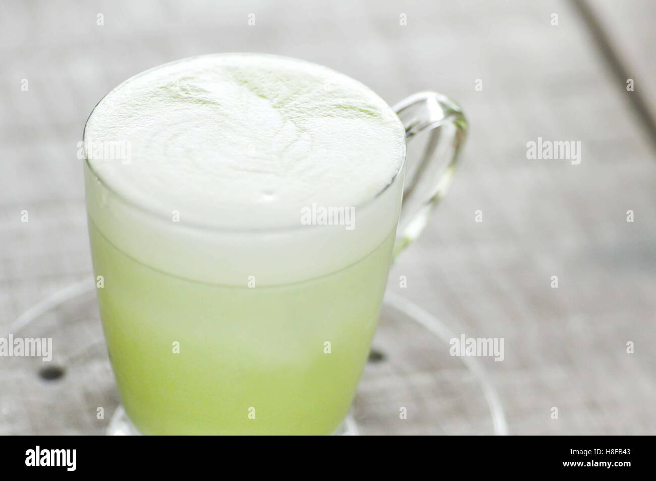 a cup of hot milk green tea Stock Photo - Alamy