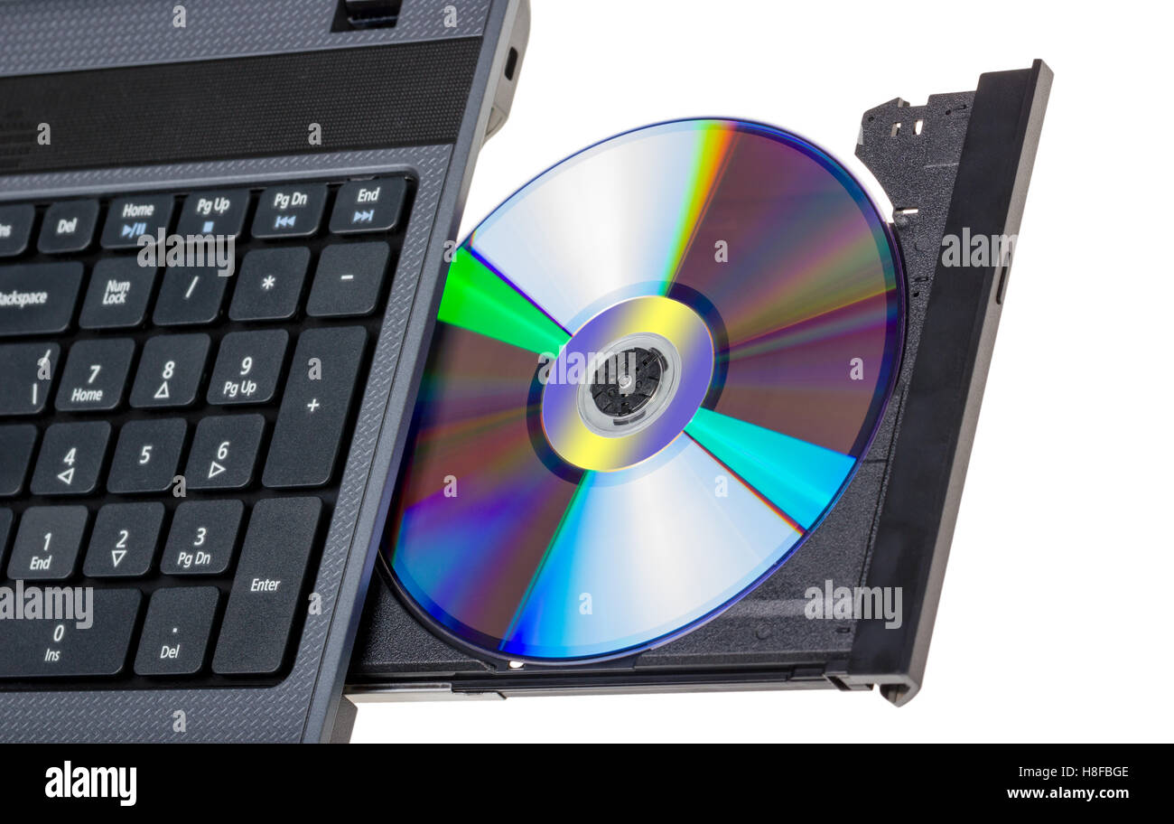 Electronic collection - Laptop with open DVD tray isolated on a white ...