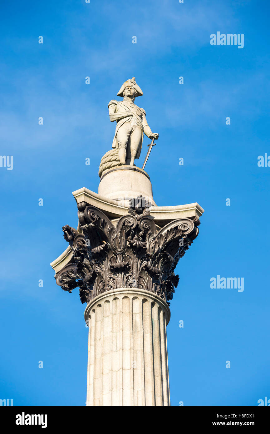 Statue of Admiral Horatio Nelson standing atop the landmark Nelson's ...